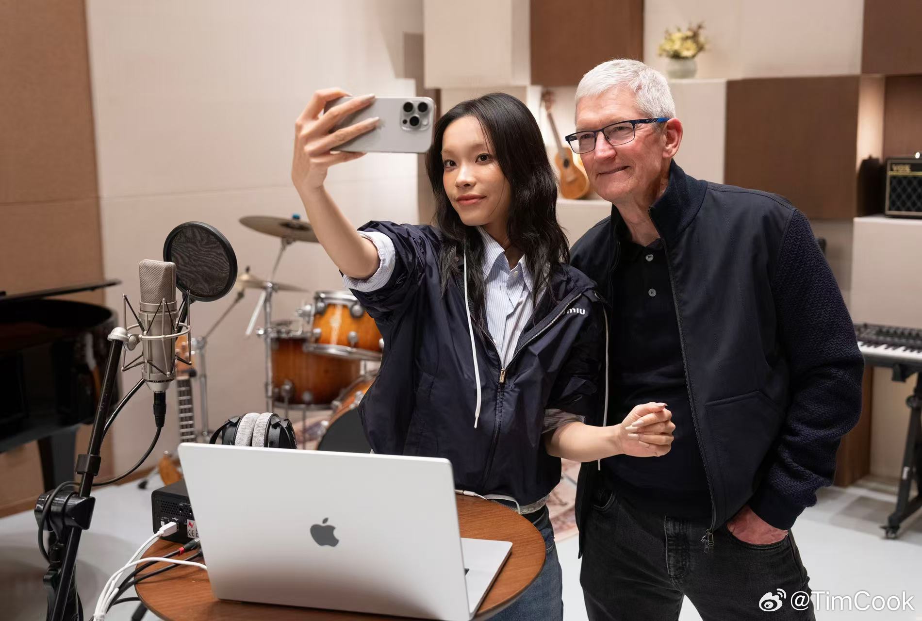 Why did Tim Cook visit a farm in Beijing, China?